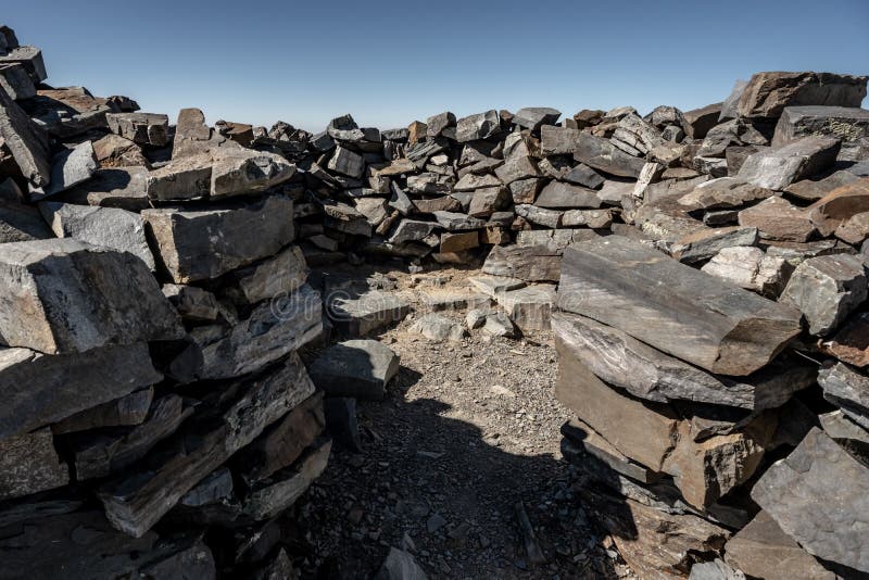 Looking into Stacked Stone Wind Break Stock Image - Image of scenery ...