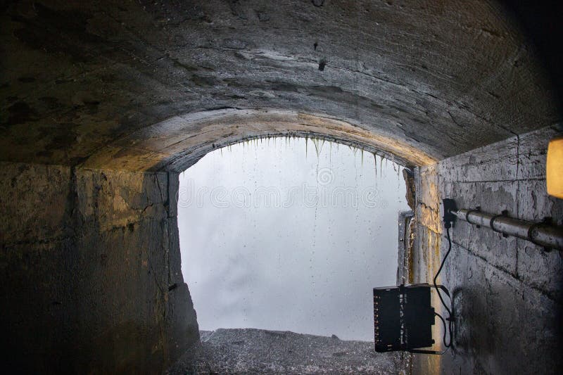 Looking through a Tunnel Under Horseshoe Falls at the Waterfalls Water ...