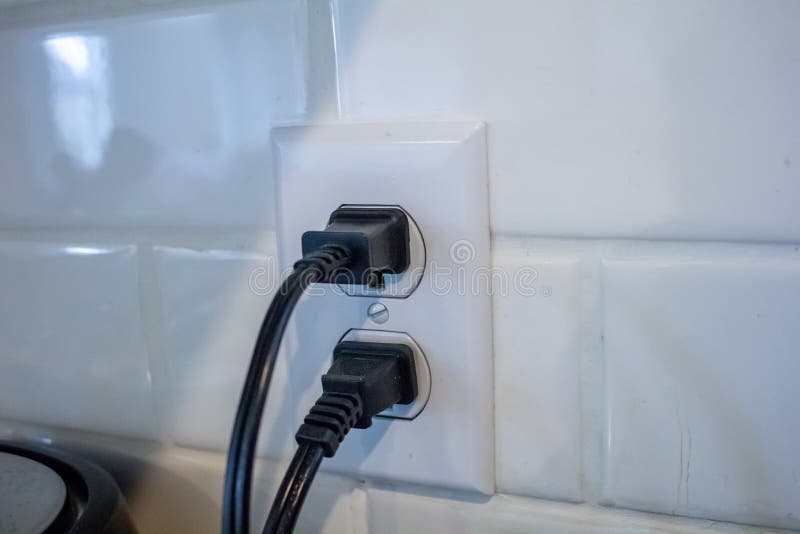 Plugs in the socket stock image. Image of macro, acdc - 166689971