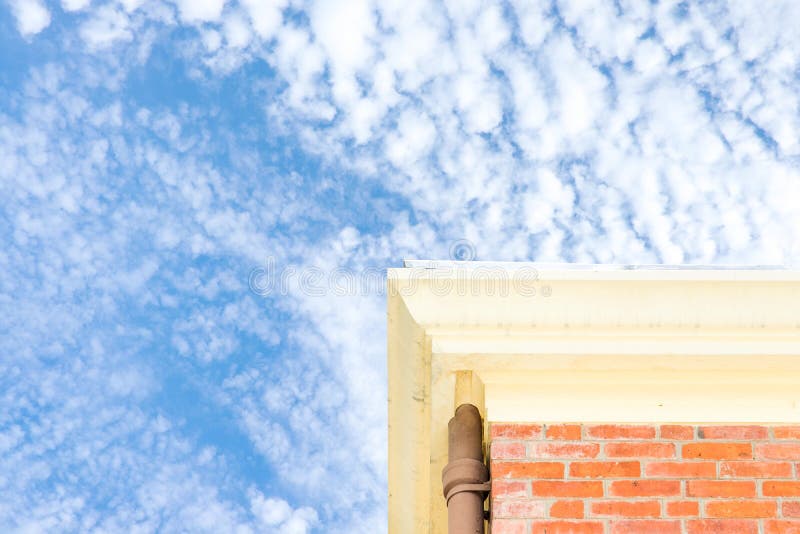 Looking Up at Brick House with Blue Sky. Stock Image - Image of ...