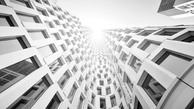 Bottom View of Modern Skyscraper in Business District Against Blue Sky ...