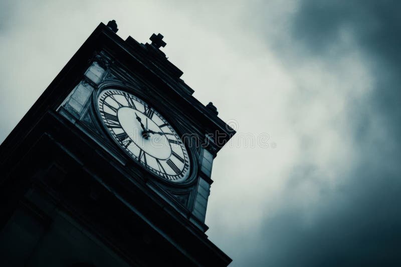 Looking Up at the Clock Tower Under Cloudy Sky and Time Theme Stock ...