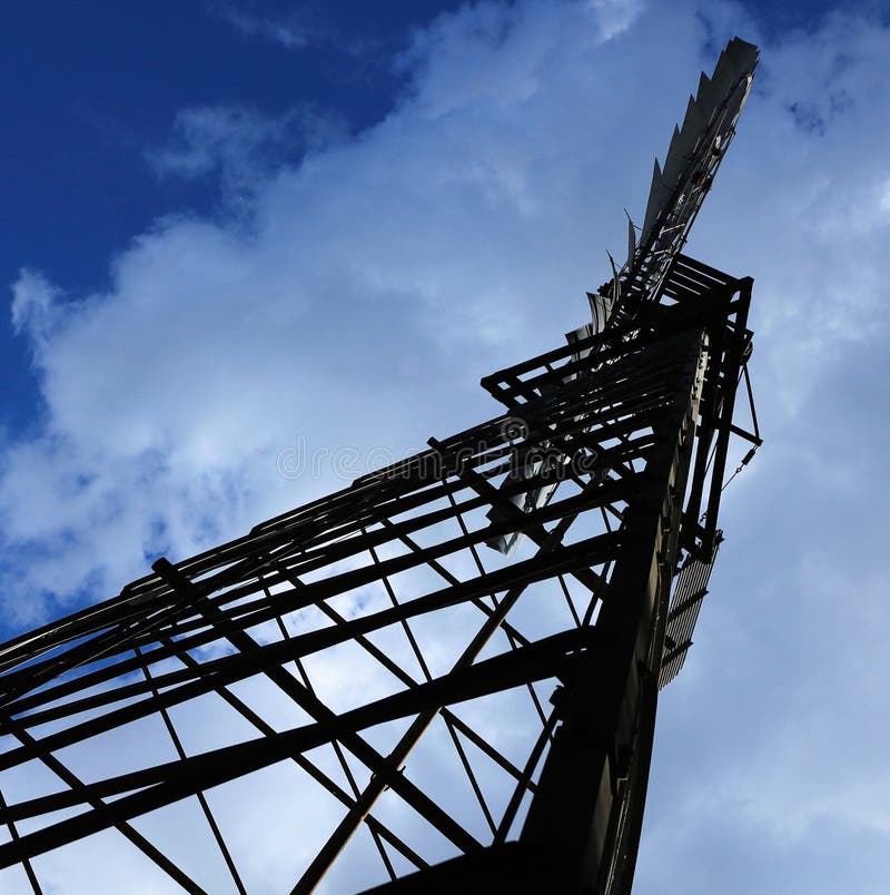 Looking Up at a Cloudy Sky with a Windmill Stock Image - Image of blue ...