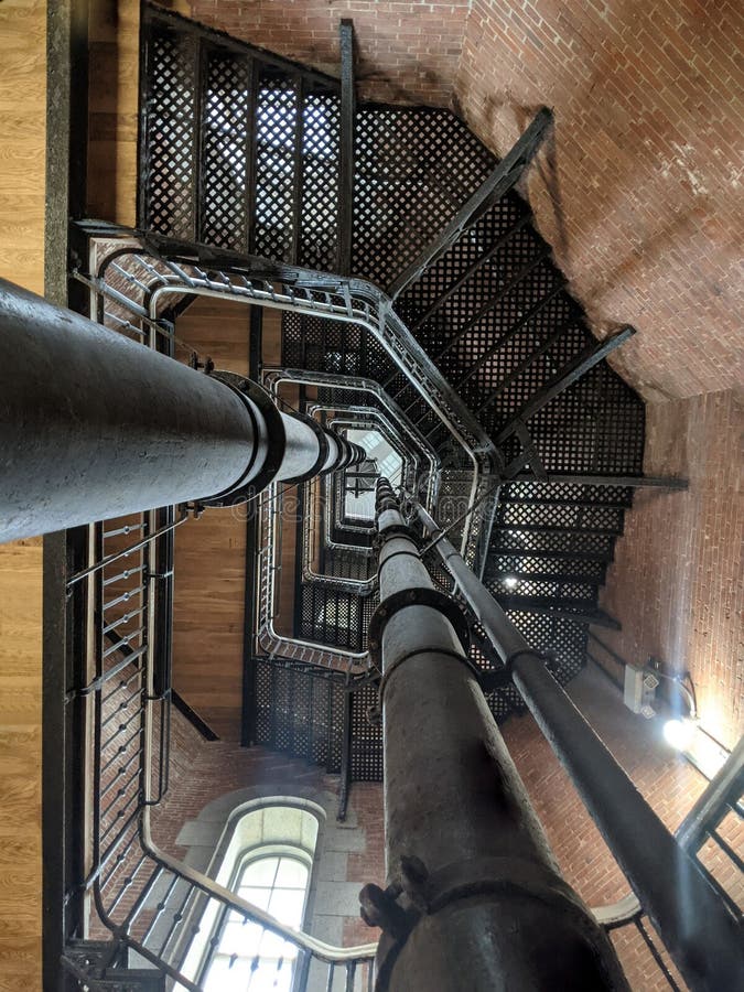 An Old Looking Building on the Top of a Mountain with a Valley Below ...