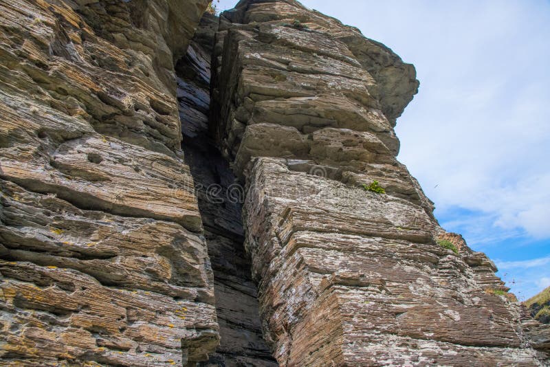 Looking Up at a Large Stack Rock on the Cornish Coast Stock Photo ...