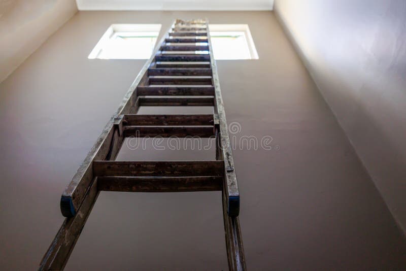Looking up a long ladder stock image. Image of forward - 248128075