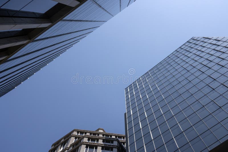 Looking Up Modern High-rise Office Buildings with Blue Sky Stock Photo ...