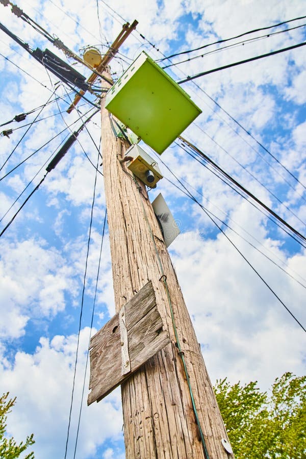Looking Up at Telephone Pole with Many Wires and Green Box Stock Photo ...