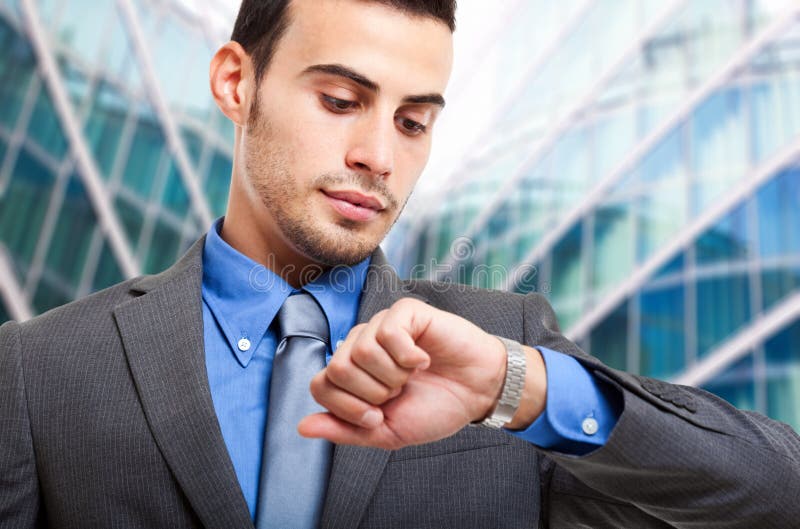 Looking at the watch stock image. Image of hurry, departure - 27223723