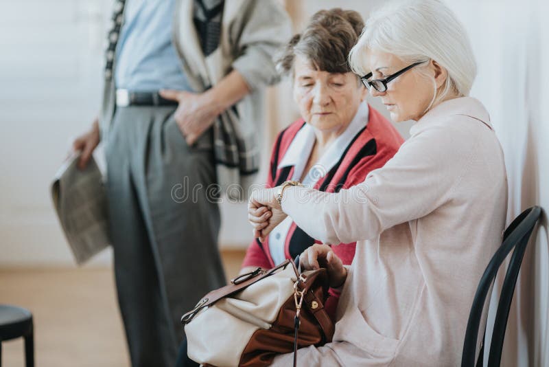 Looking at the watch stock image. Image of hurry, physician - 237571565