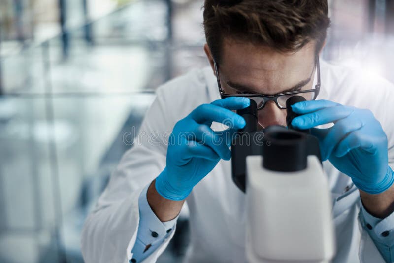 Looking at Ways To Expand the Knowledge of Science. a Young Male ...