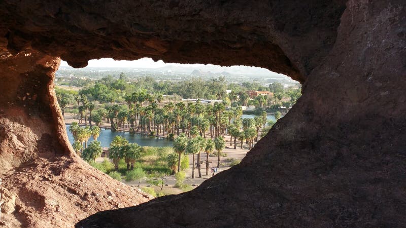 Looking through the Whole in the Rock Stock Photo - Image of looking ...