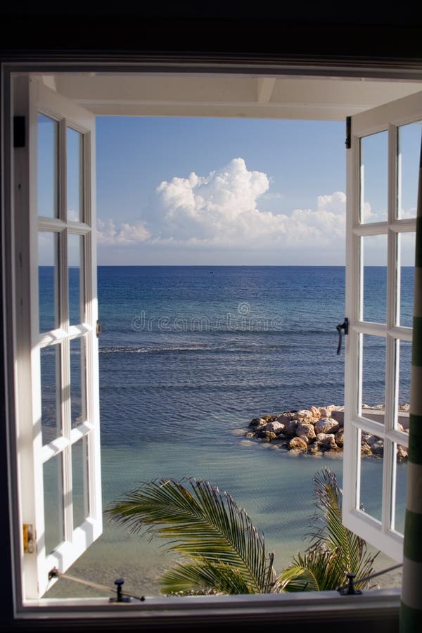 Sea View through Window at the Beach, Halfmoon Bay, Jamaica Stock Photo ...