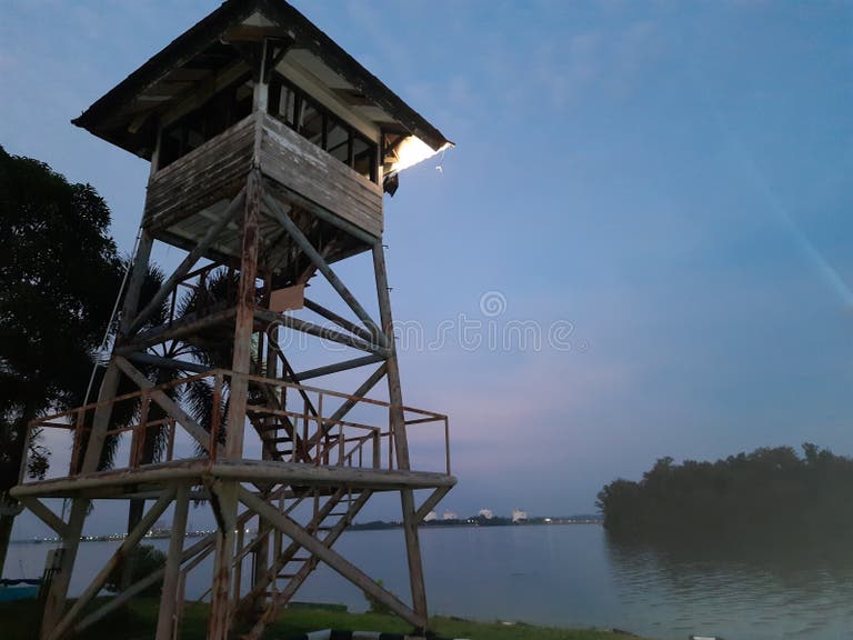 Lookout tower on the beach stock photo. Image of transport - 266115922