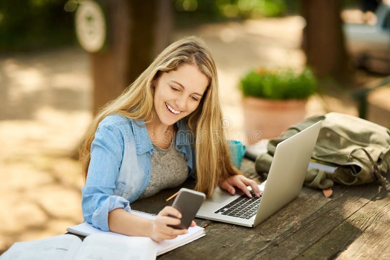 Looks Like Its Break Time. a Young Woman Studying Outdoors. Stock Image ...