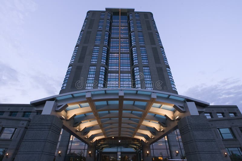 Looming Building stock image. Image of glass, dusk, perspective - 468931