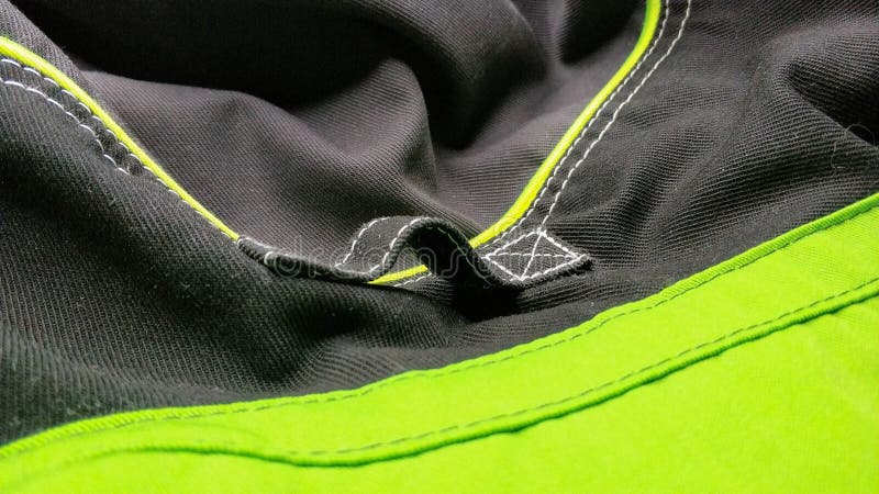Loop on Black and Green Work Clothes. Workwear Close-up Seam, Screed ...