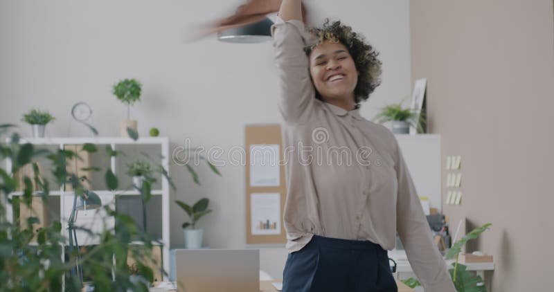 Loop of Cheerful African American Business Lady Dancing and Having Fun ...