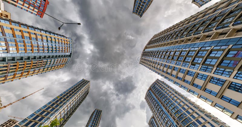 Loop Circular Motion and View Up from Ground To Storm Clouds Sky among ...