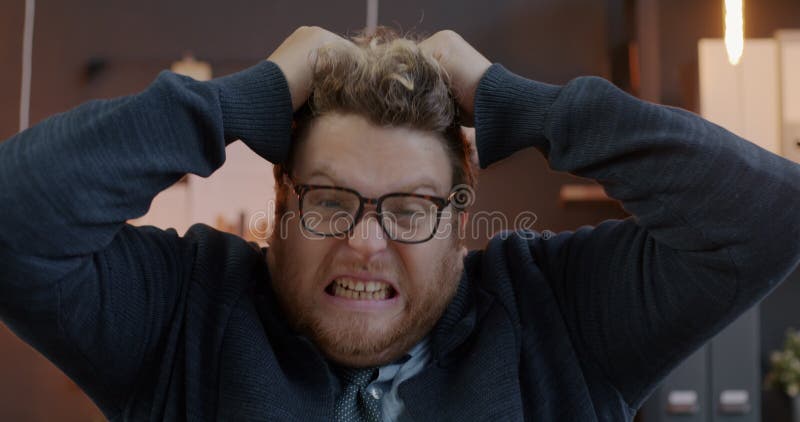 Loop Portrait of Crazy Businessman Pulling Hair and Screaming ...