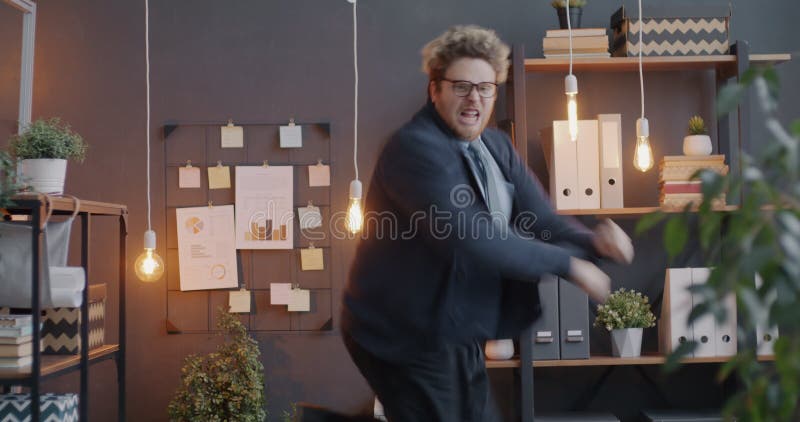 Loop Portrait of Creative Office Worker Dancing and Screaming Listening ...