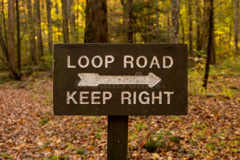 Loop Road Sign Directs Drivers To the Right Stock Photo - Image of ...