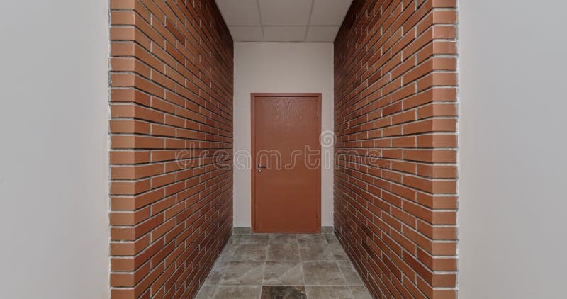Loop Seamless Rotation in White Empty Long Corridor with Red Brick ...