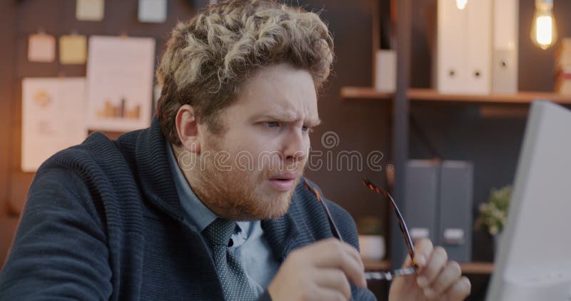 Loop of Shocked Entrepreneur Putting on Glasses and Staring at ...