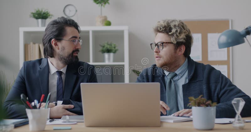 Loop of Two Businessmen Colleagues Doing High-five Hand Gesture ...