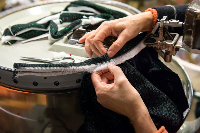 Looping machine operator stock photo. Image of sewing - 63595408