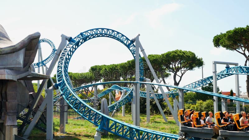 Looping rollercoaster ride stock video. Video of entertainment - 126578541