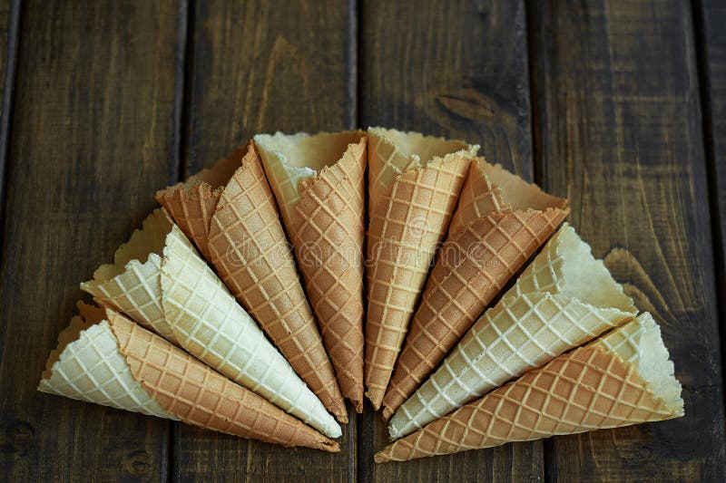 Loose Ice Cream Waffle Cones or Cornets Scattered on a Rustic Wo Stock ...
