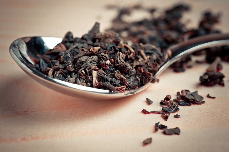 Loose Tea in a Metal Spoon on a Wooden Surface Stock Image - Image of ...