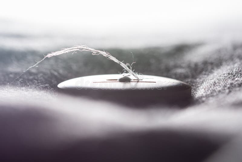 Loose Thread in the Seam of a Button on a Bedspread Stock Photo - Image ...