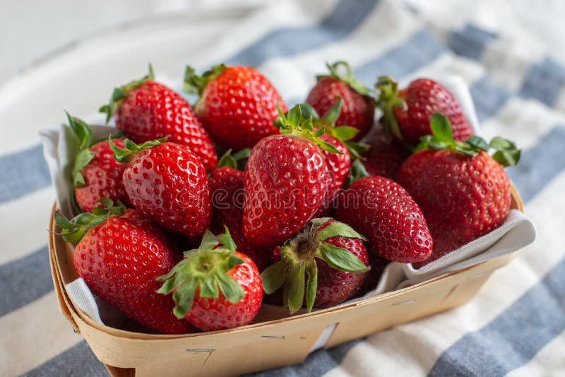 4 Strawberries of Different Size and Shape Stock Image - Image of ...