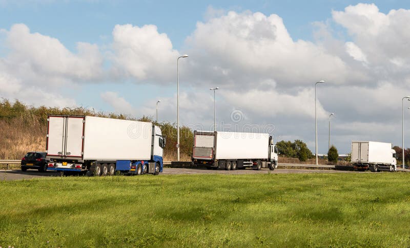 Lorries on the road stock photo. Image of lorry, goods - 78934542