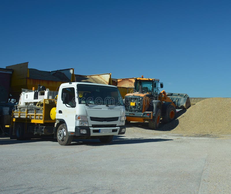 Lorry and bulldozer stock photo. Image of lorry, industry - 39197022