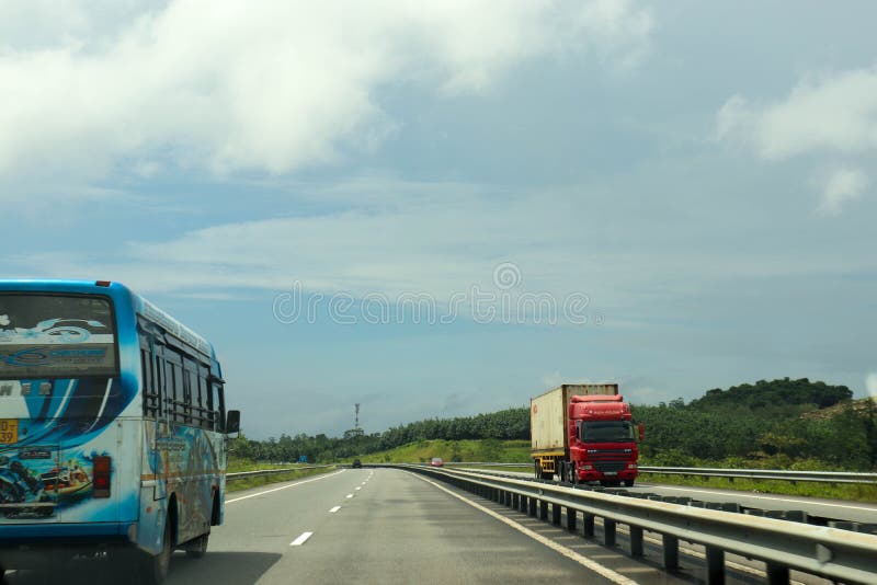 Lorry and Bus Highway Road editorial photography. Image of road - 255287502