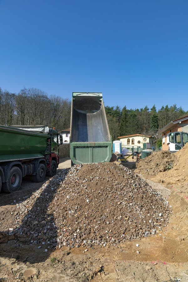 Lorry at a Construction Side Unloading Gravel Stock Photo - Image of ...