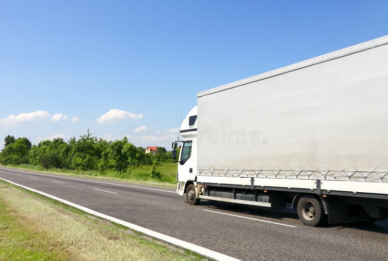 The lorry on a road stock image. Image of large, lanes - 14659799