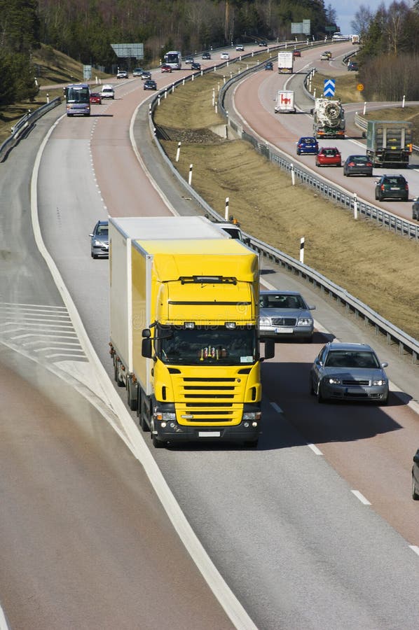 Lorry Surrounded by Traffic Stock Image - Image of veichles, haulage ...