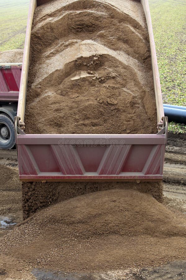 Lorry tipping sand stock photo. Image of heap, tipping - 19413562