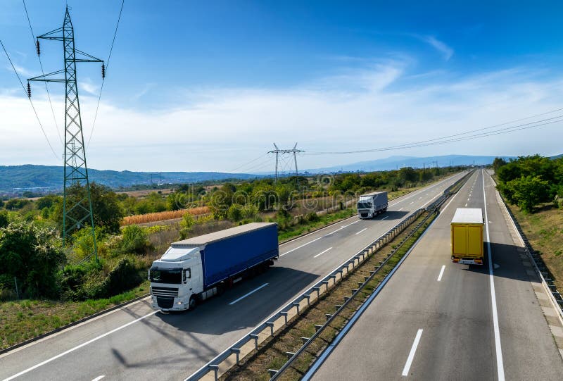 Lorry Trucks Passing by on a Country Highway Stock Photo - Image of ...