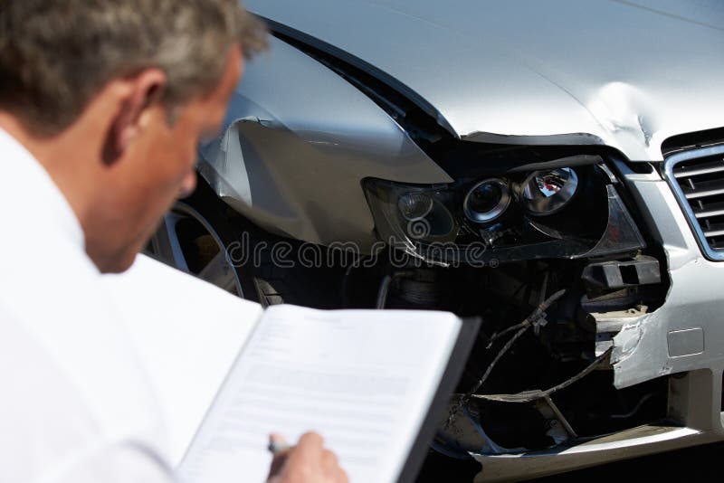 Loss Adjuster Inspecting Car Involved in Accident Stock Photo - Image ...