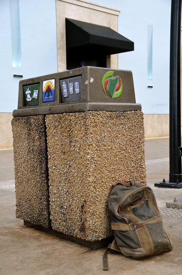 Lost Backpack by Garbage Receptacle Stock Image - Image of spanish ...