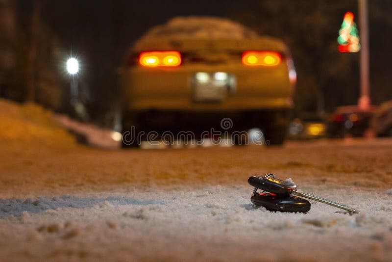 Lost Car Keys on the Road Powdered with the First Snow at Night. on ...
