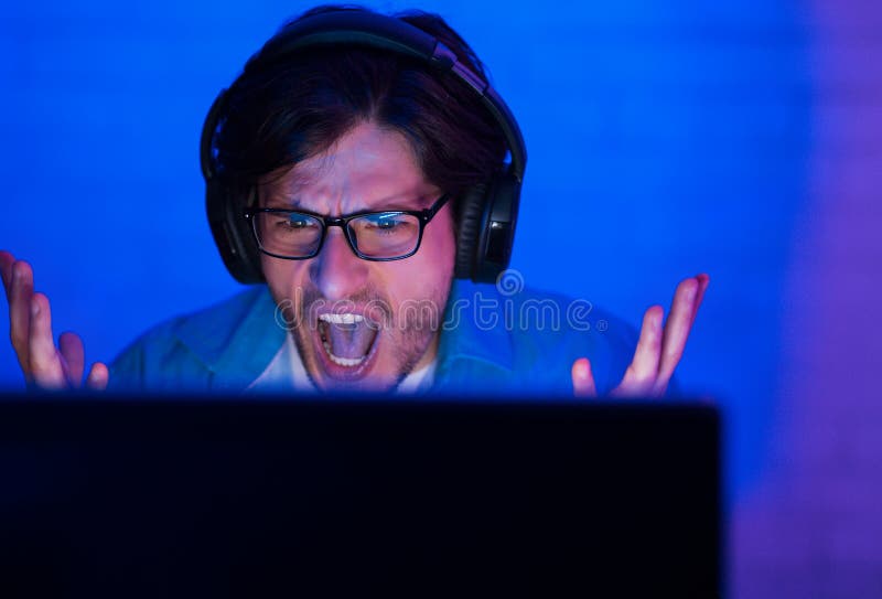 Angry Gamer Losing Game Playing Online on Computer at Home Stock Image ...