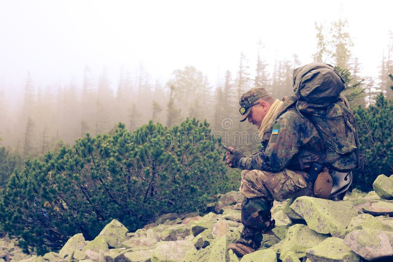 Traveler Man Backpacker Using a Smart Phone Stock Photo - Image of ...