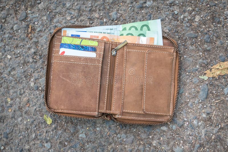 Lost Leather Wallet with Money on Street Stock Photo - Image of people ...