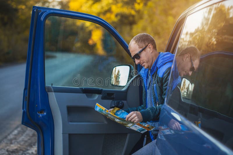 Lost Driver Looking for a Way on the Map Stock Photo - Image of nature ...